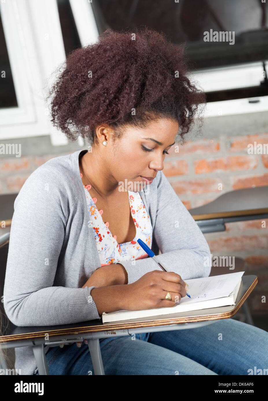 Student sitting exam hall hi-res stock photography and images - Alamy