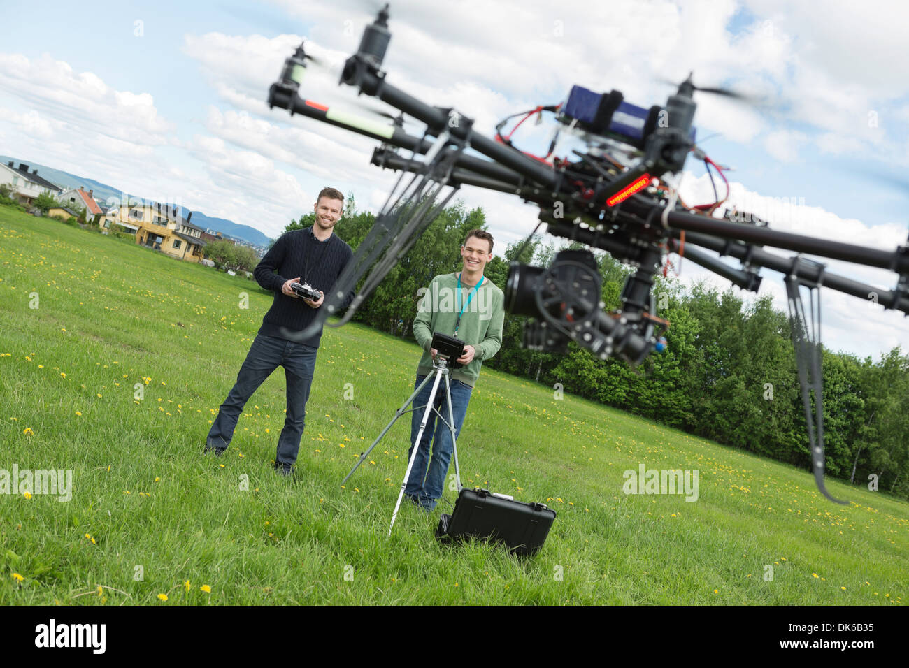 Engineers Flying UAV Helicopter in Park Stock Photo - Alamy