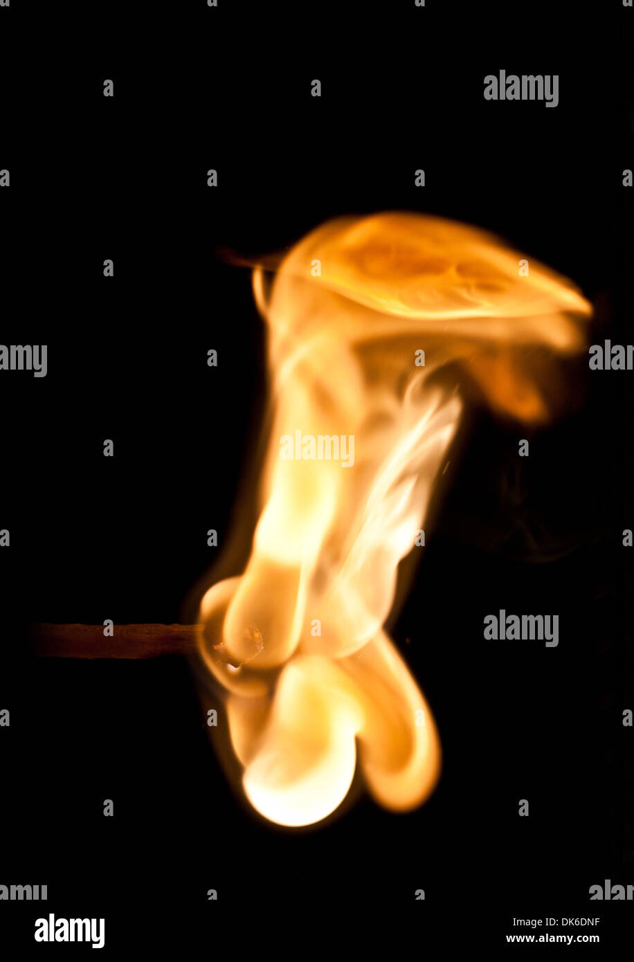 Shape of fire flame on flammable match Stock Photo - Alamy