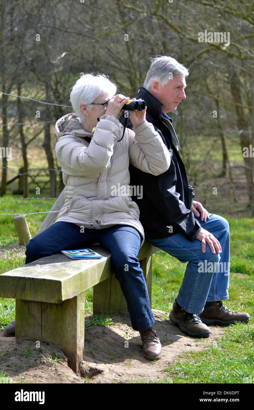 older couple birdwatching Stock Photo - Alamy