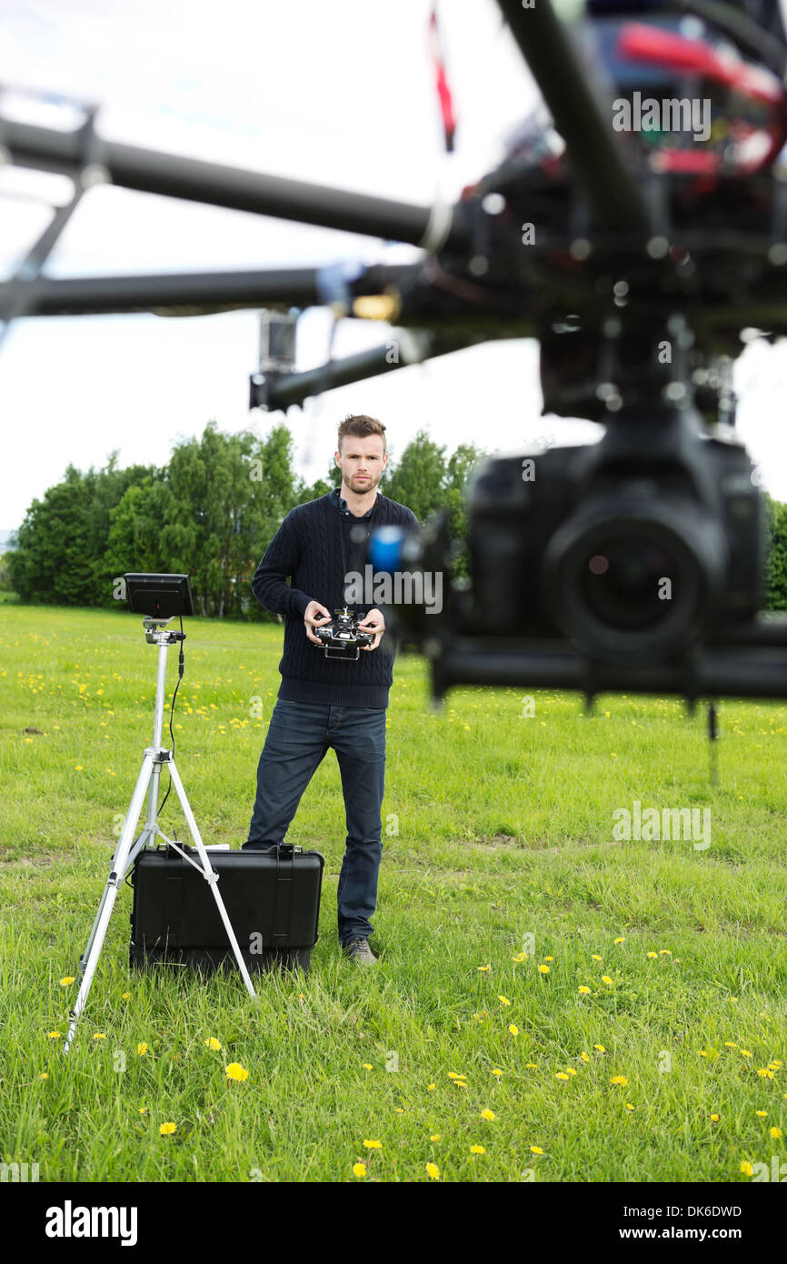 Engineer Operating UAV Octocopter in Park Stock Photo - Alamy
