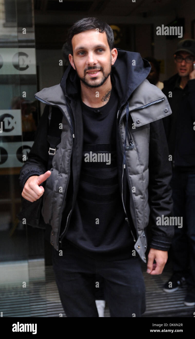 Dynamo (magician) performs a trick outside the BBC Radio 1 studios ...