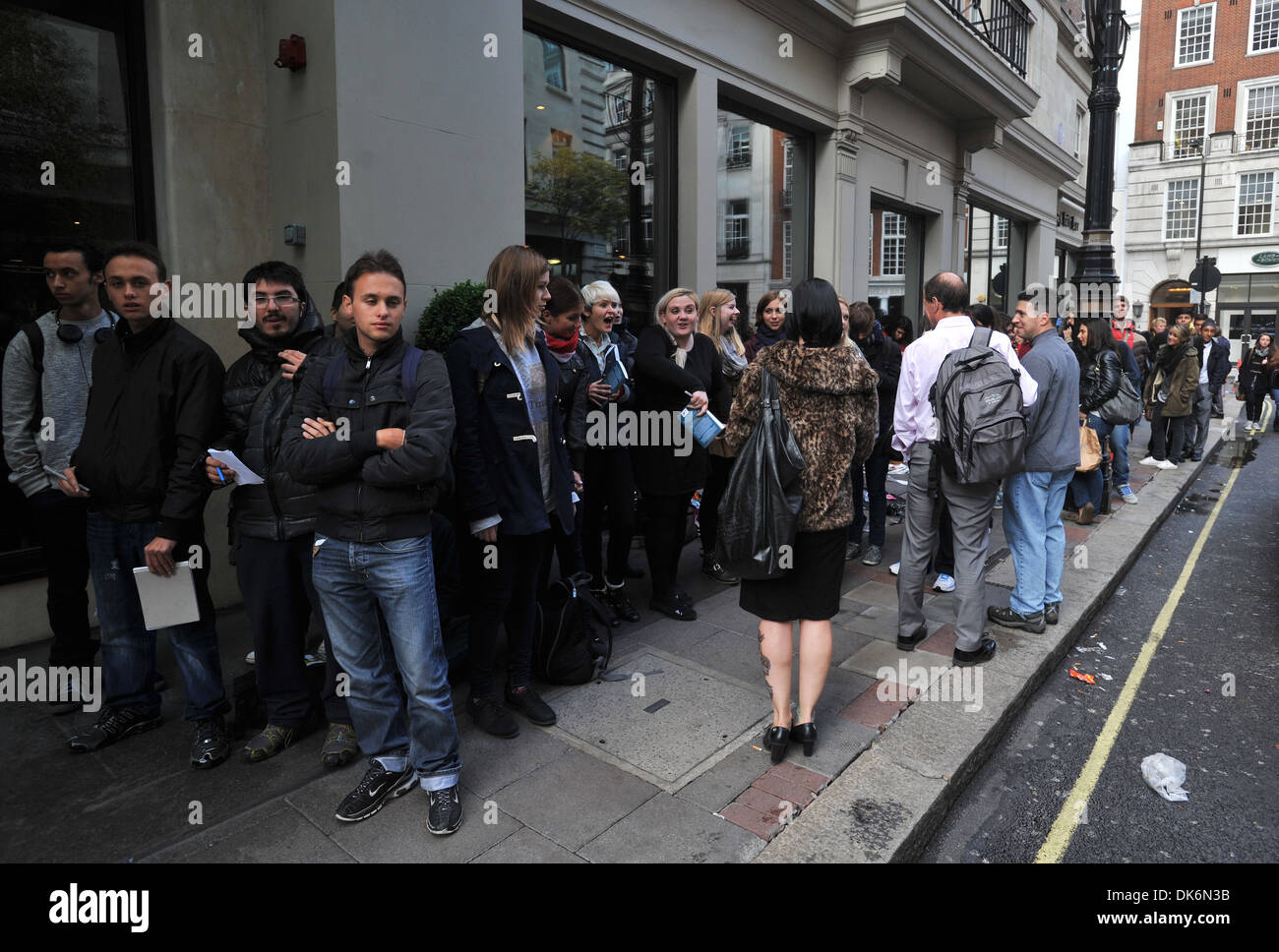 Crowds wait outside May Fair Hotel to catch a glimpse of Emma Watson ...