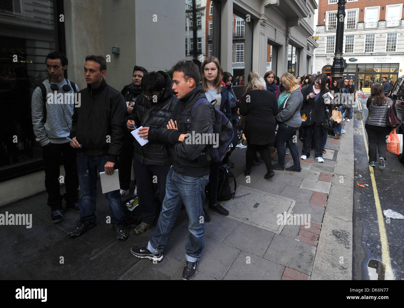 Crowds wait outside May Fair Hotel to catch a glimpse of Emma Watson ...