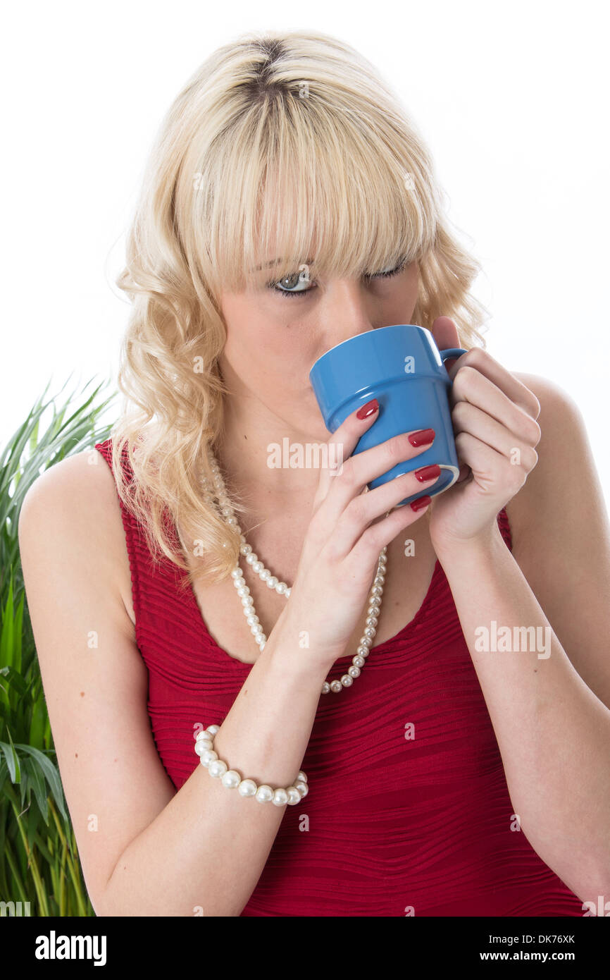 Model Released. Attractive Young Woman Drinking Coffee Stock Photo - Alamy