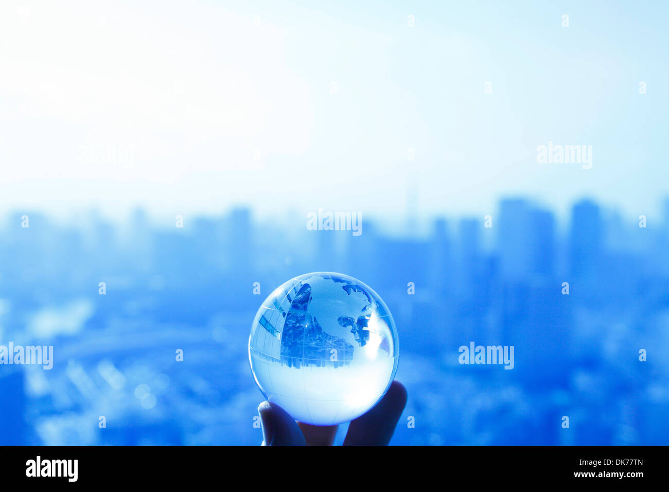 Glass earth globe Stock Photo - Alamy