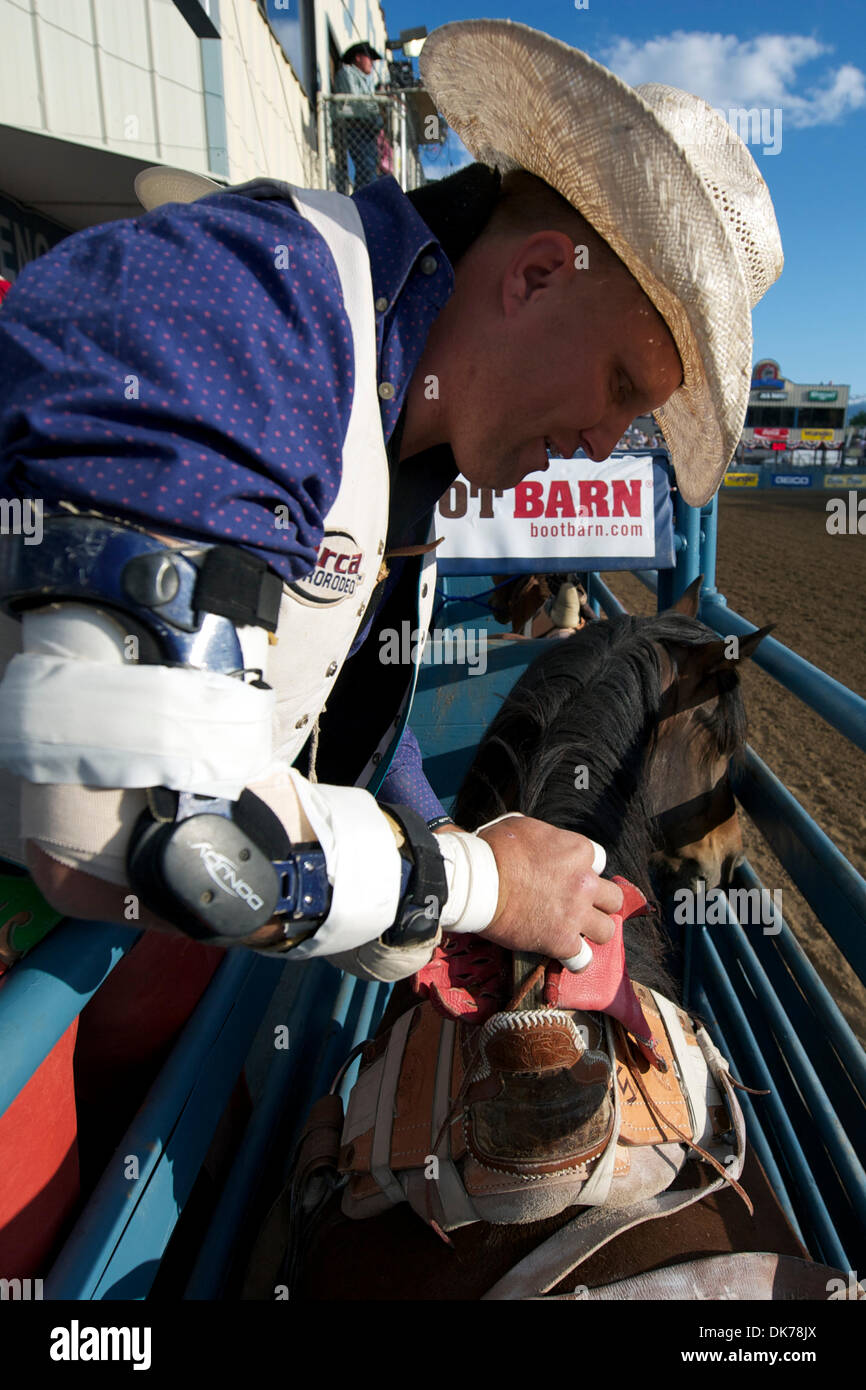 June 17, 2011 - Reno, Nevada, U.S - Heath Ford of Slocum, TX straps his ...