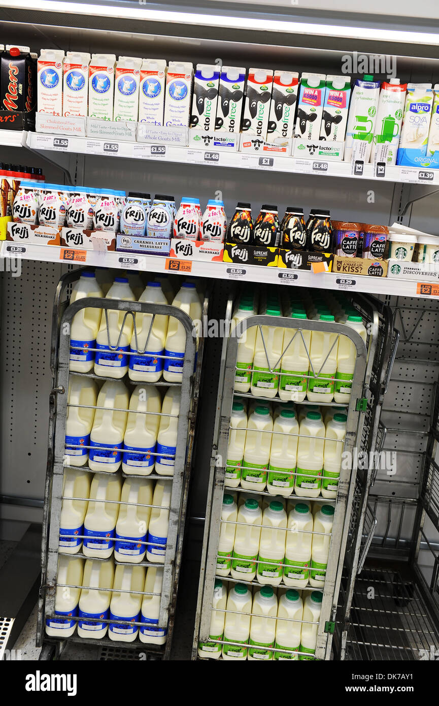 Milk for sale in a supermarket. Supermarket interior showing milk ...