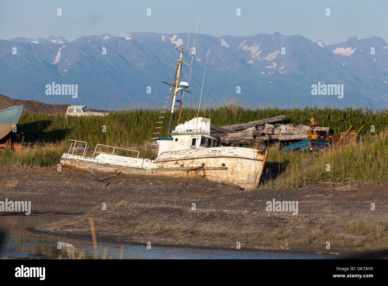 A shipwreck at a junkyard on The Spit in Homer, Alaska, USA Stock Photo ...