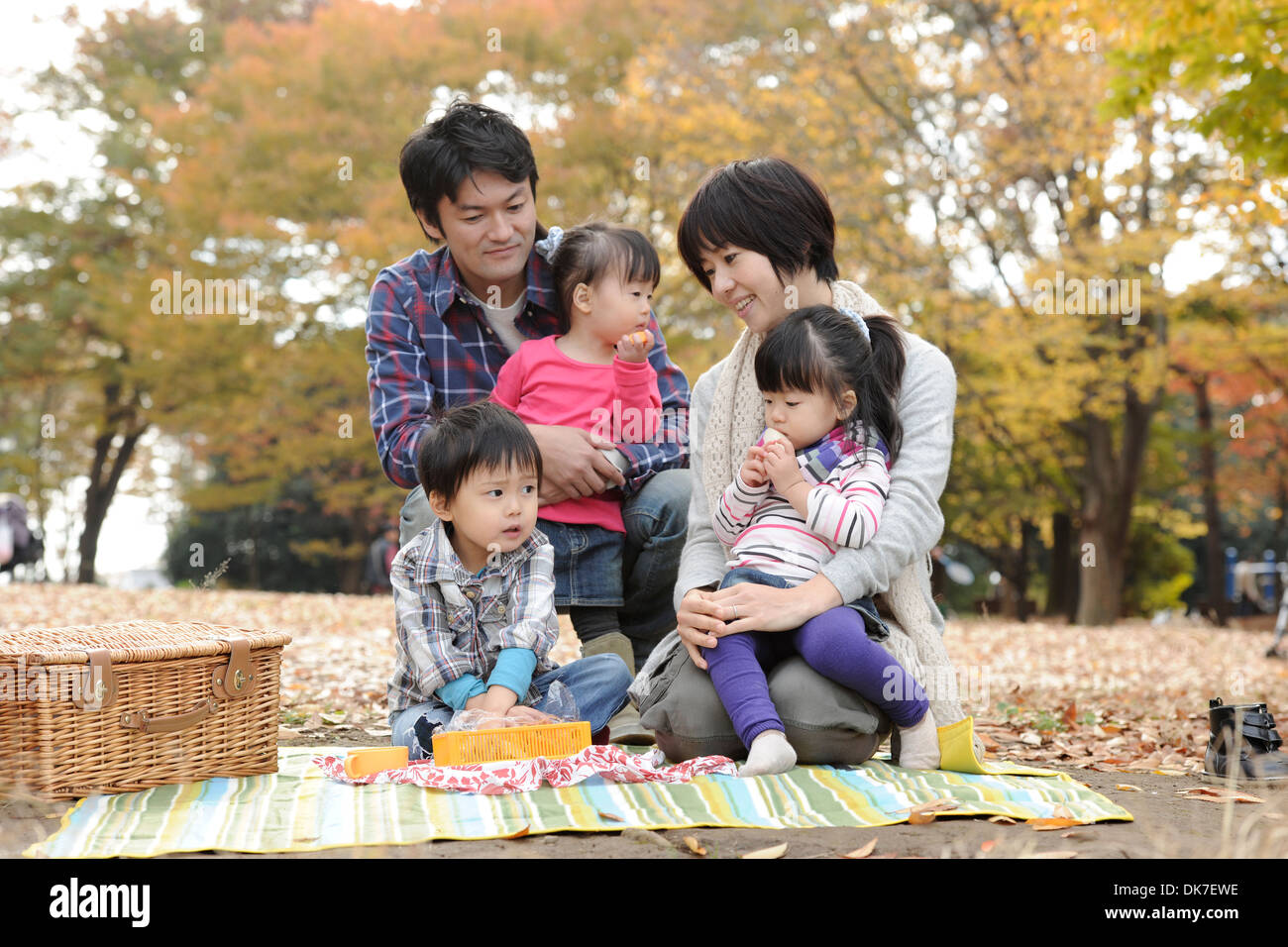 Japanese family in a park Stock Photo - Alamy