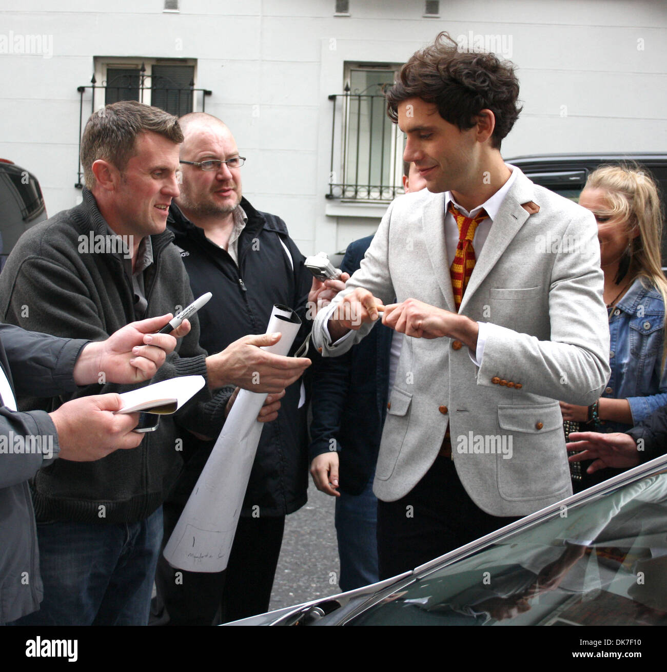 Mika signs autographs for fans ahead of his performance in city for ...