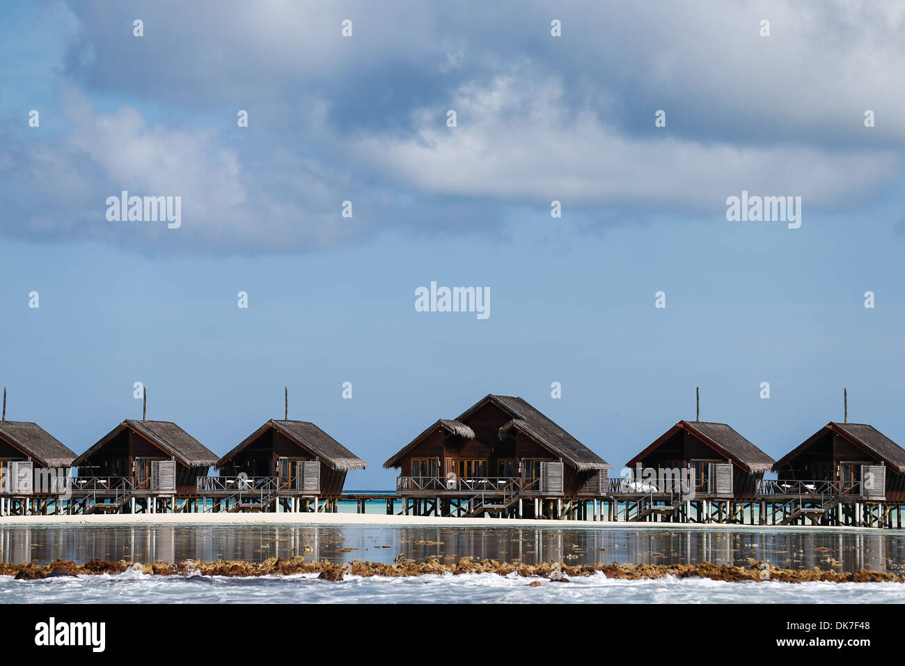 holiday destination huts cabins on a maldives island on wooden stilts ...