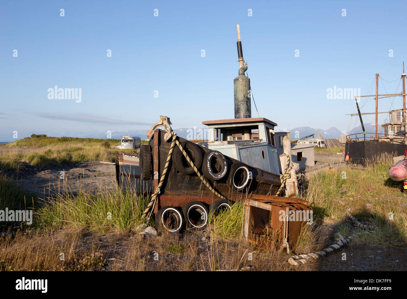 A shipwreck at a junkyard on The Spit in Homer, Alaska, USA Stock Photo ...