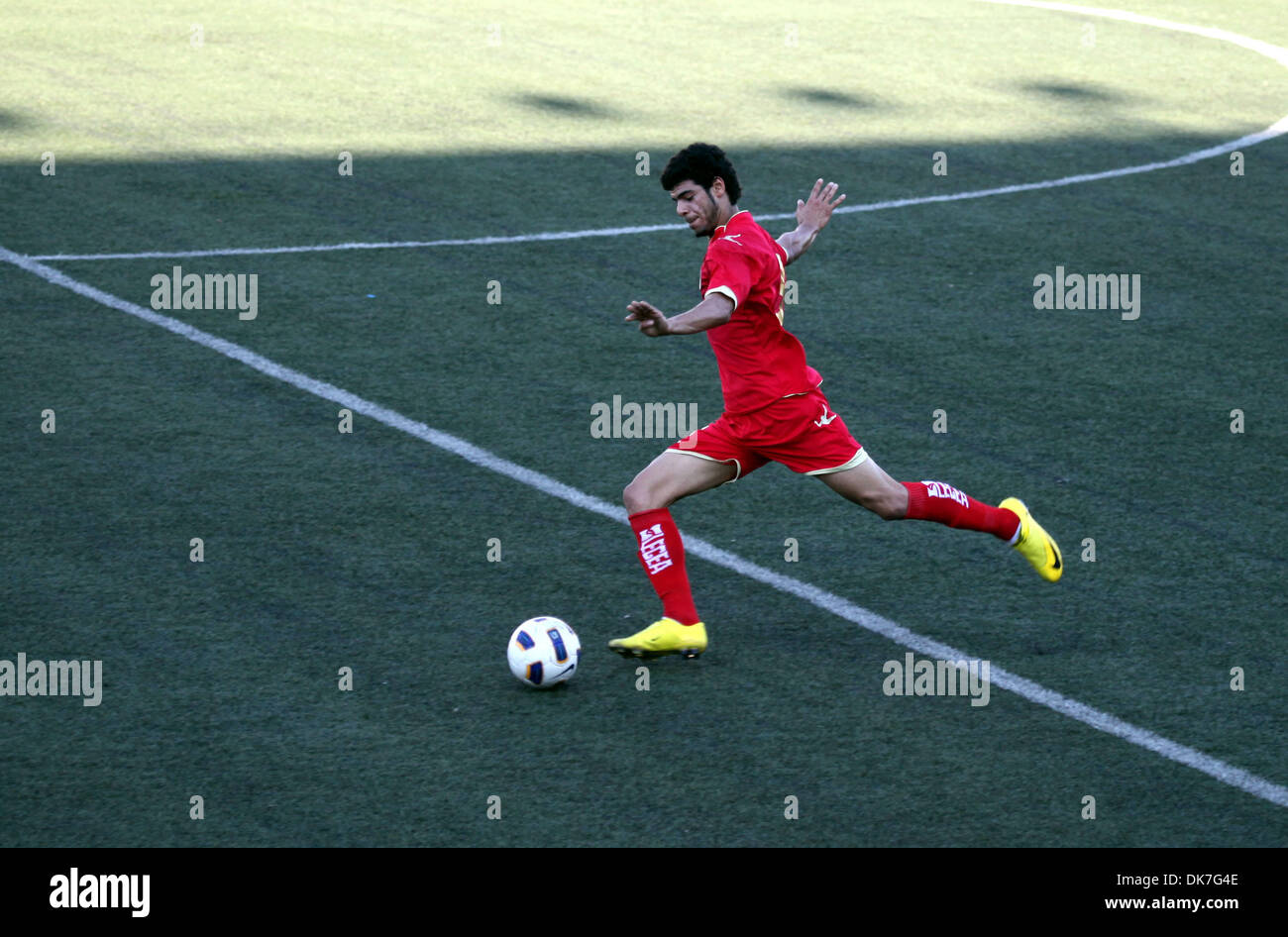 Jun 23, 2011 - Ramallah, West Bank - Bahrain's team player kicks the ...