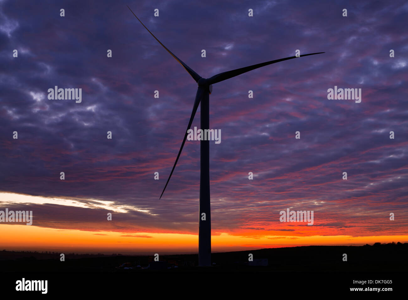 a wind turbine in the evening sunset Stock Photo - Alamy