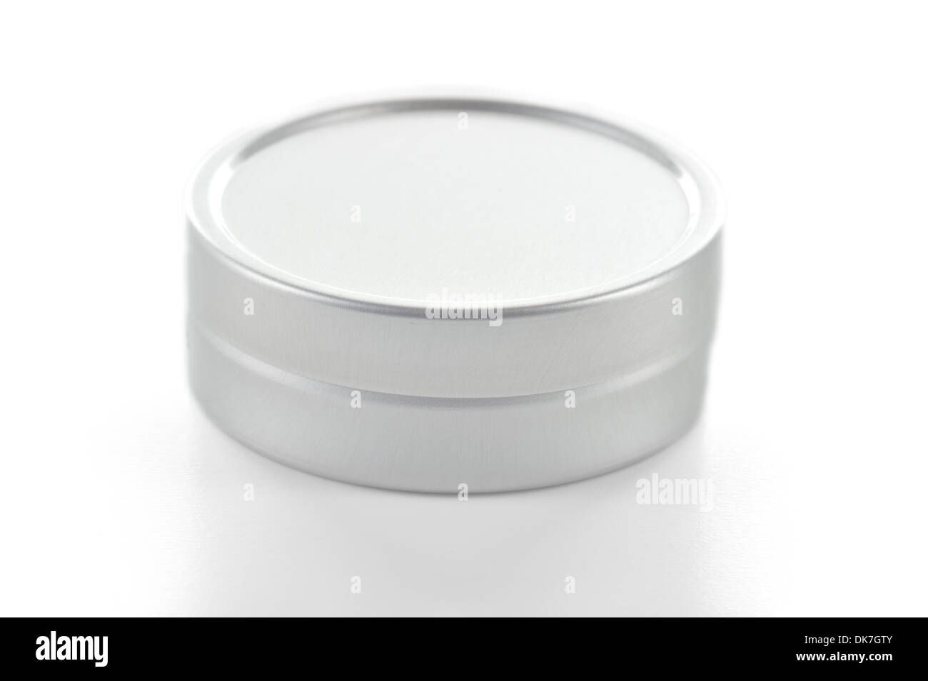 Small size metallic tin made with brushed aluminium on white background ...