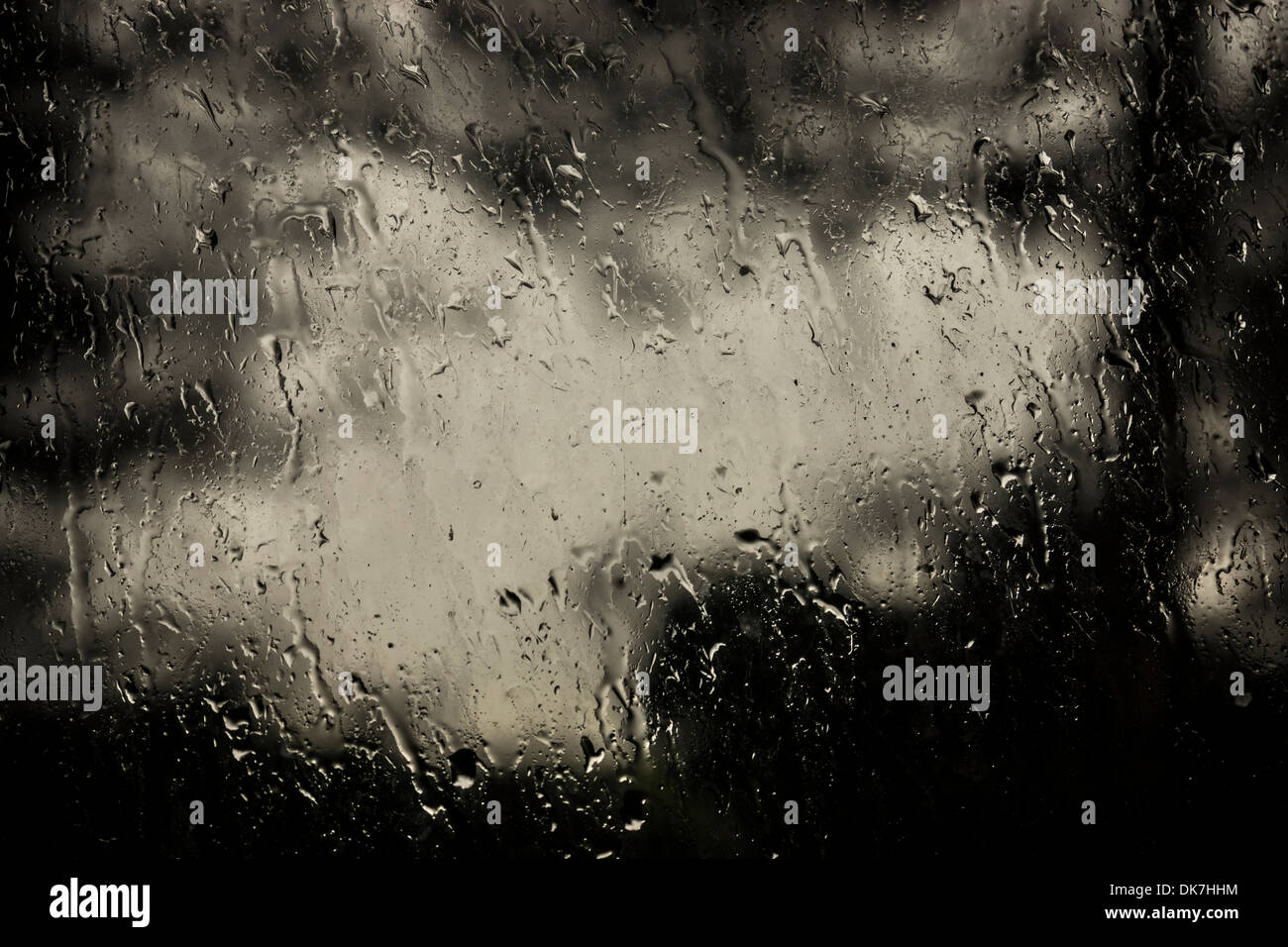 rain window water marks stormy sky window view Stock Photo - Alamy