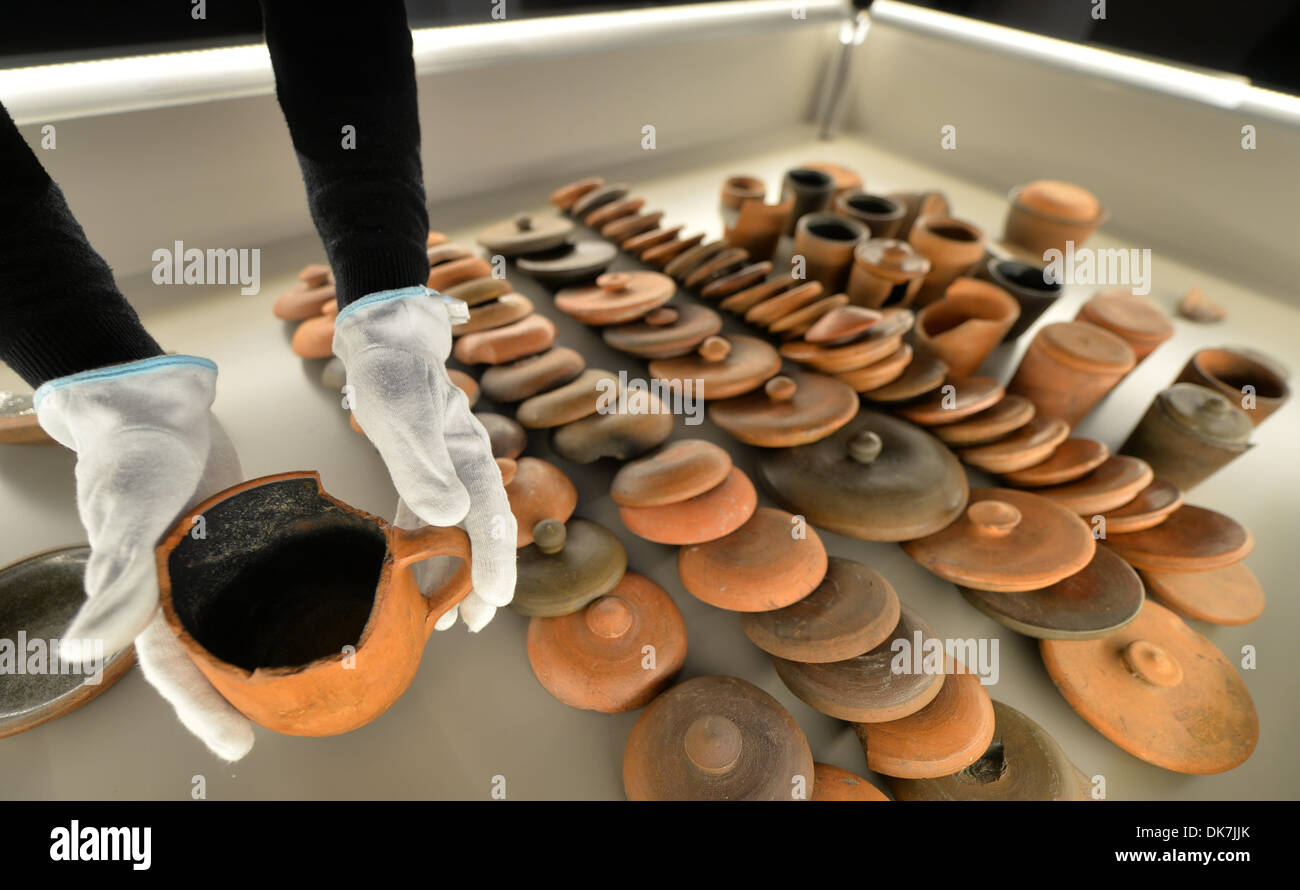 Weimar, Germany, 3rd Dec 2013. An employee of the memorial sites ...