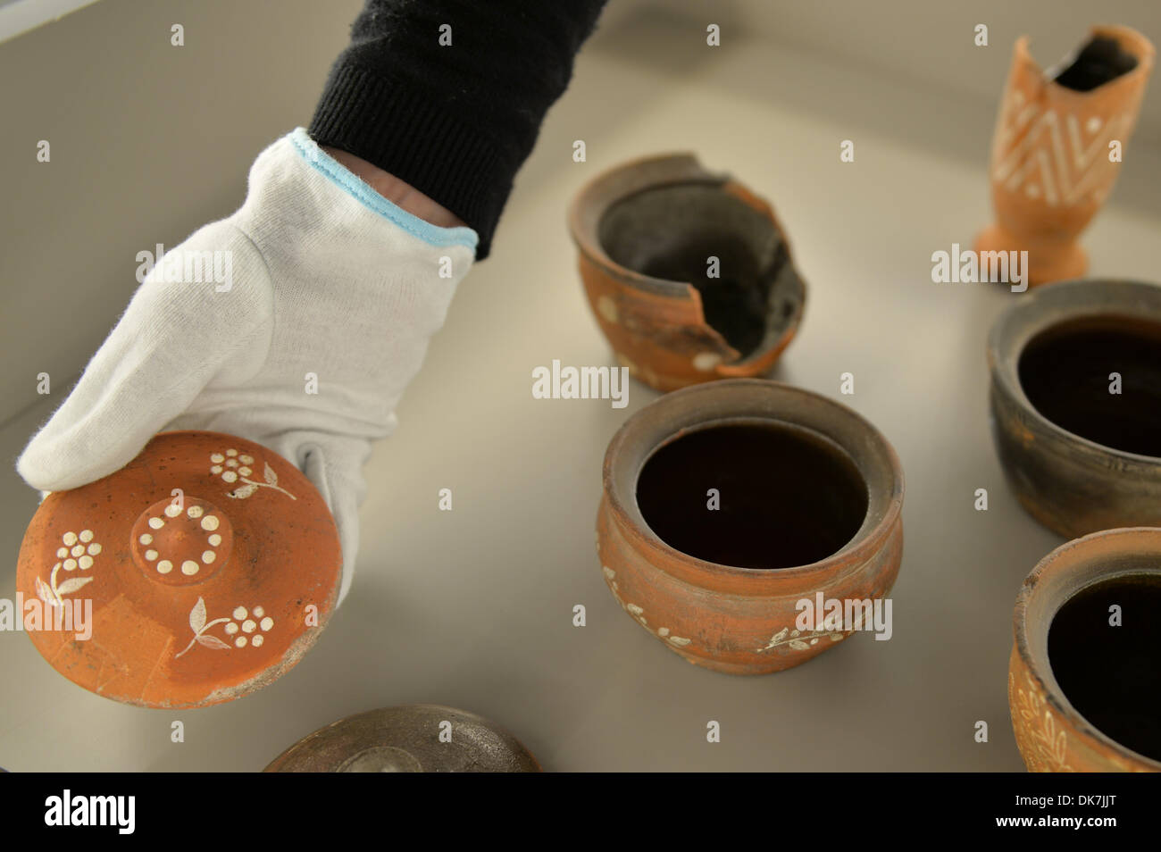 Weimar, Germany, 3rd Dec 2013. An employee of the memorial sites ...