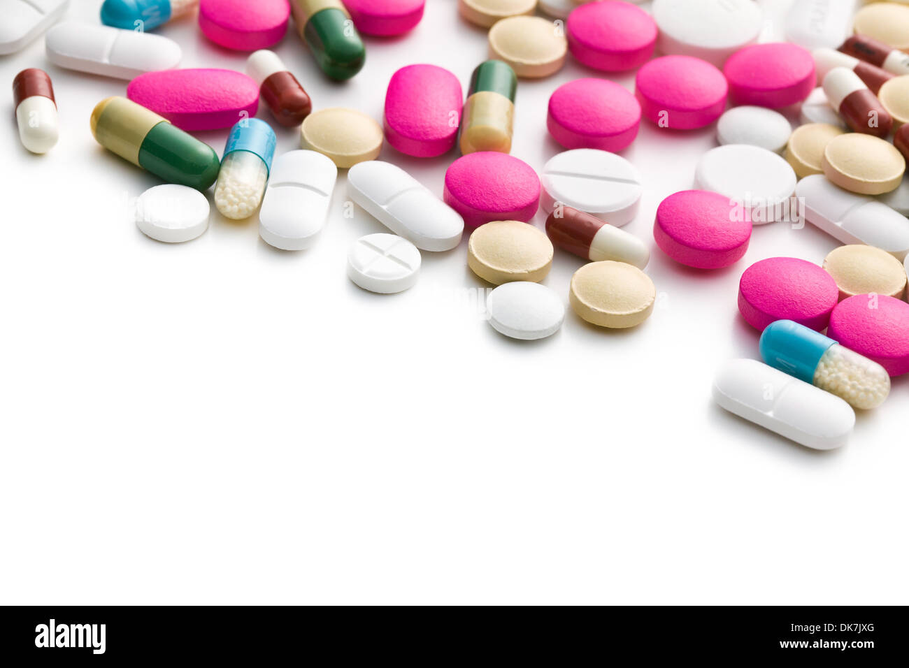 colorful pills on white background Stock Photo - Alamy