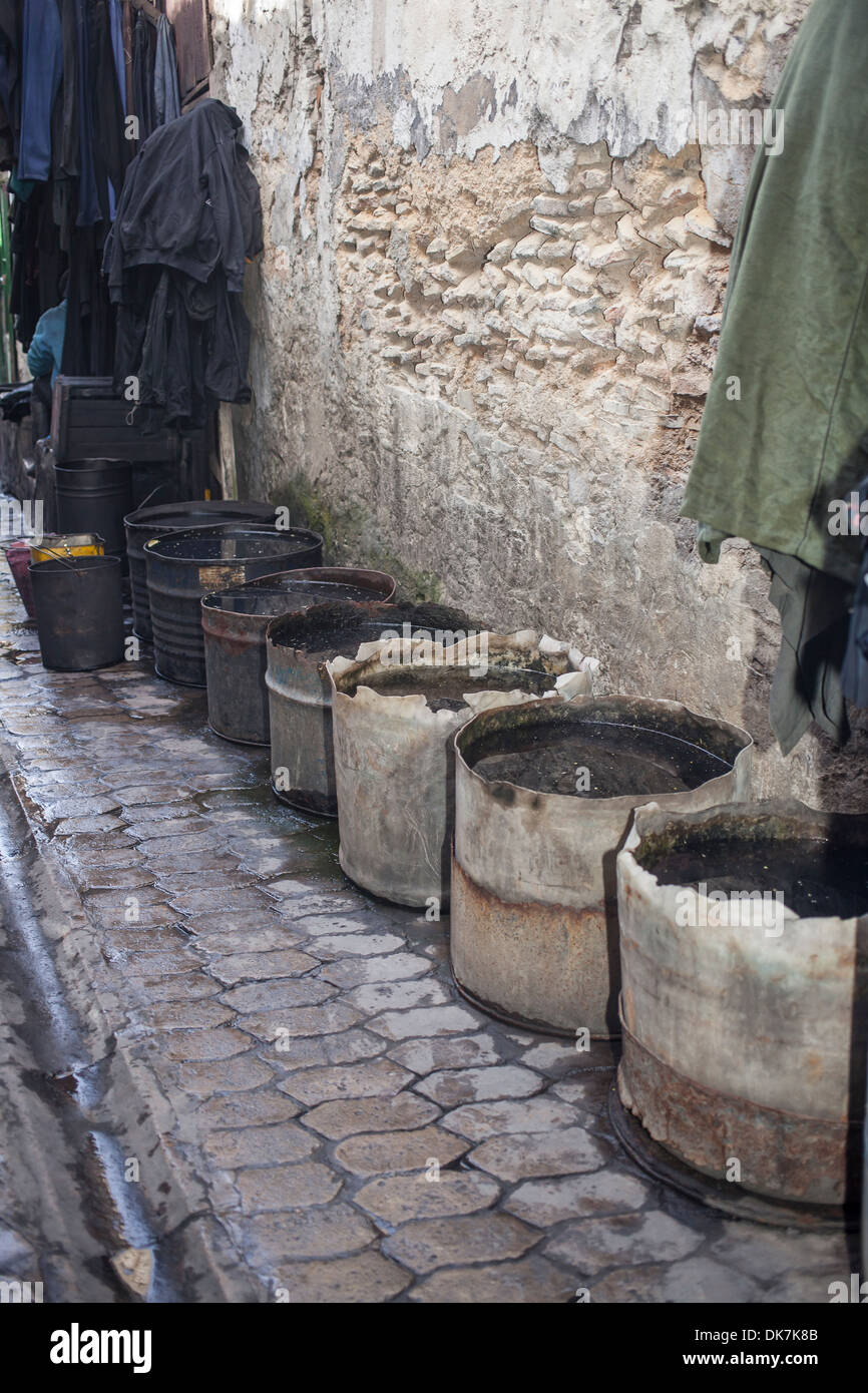 Plastic buckets with water on a street Fez, Morocco Stock Photo - Alamy