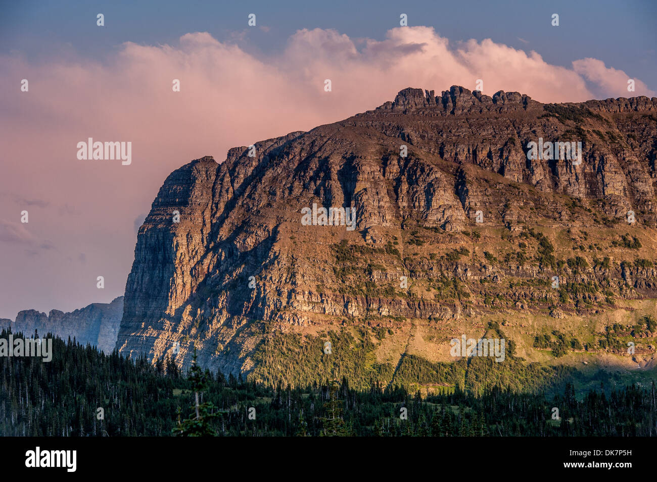 Photograph of Sunset alpenglow on Heavy Runner mountain. Glacier ...
