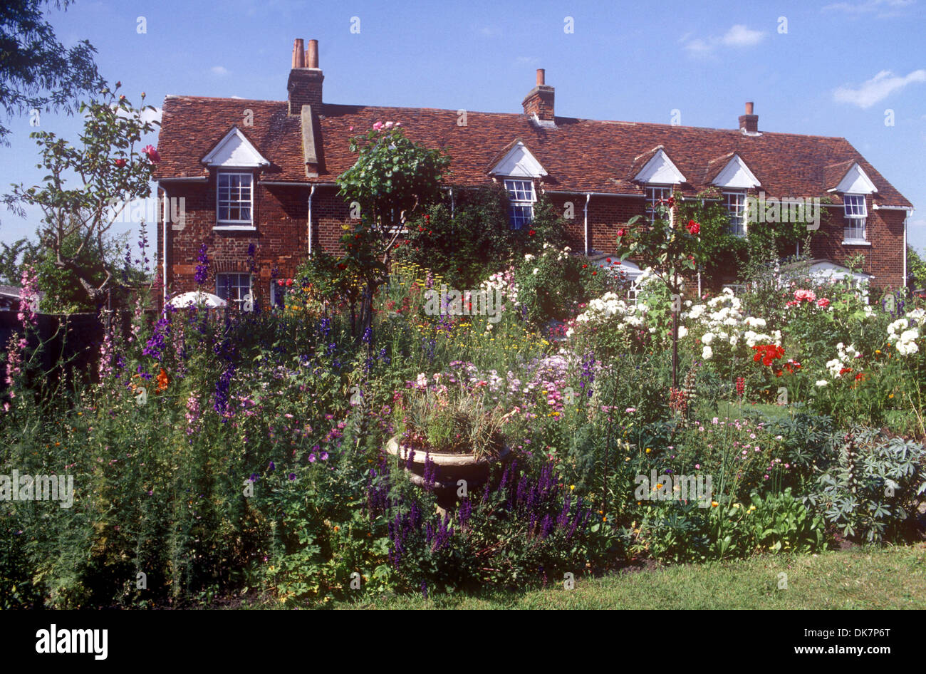 English cottage gardens in the village of Essenden Hertfordshire on a ...