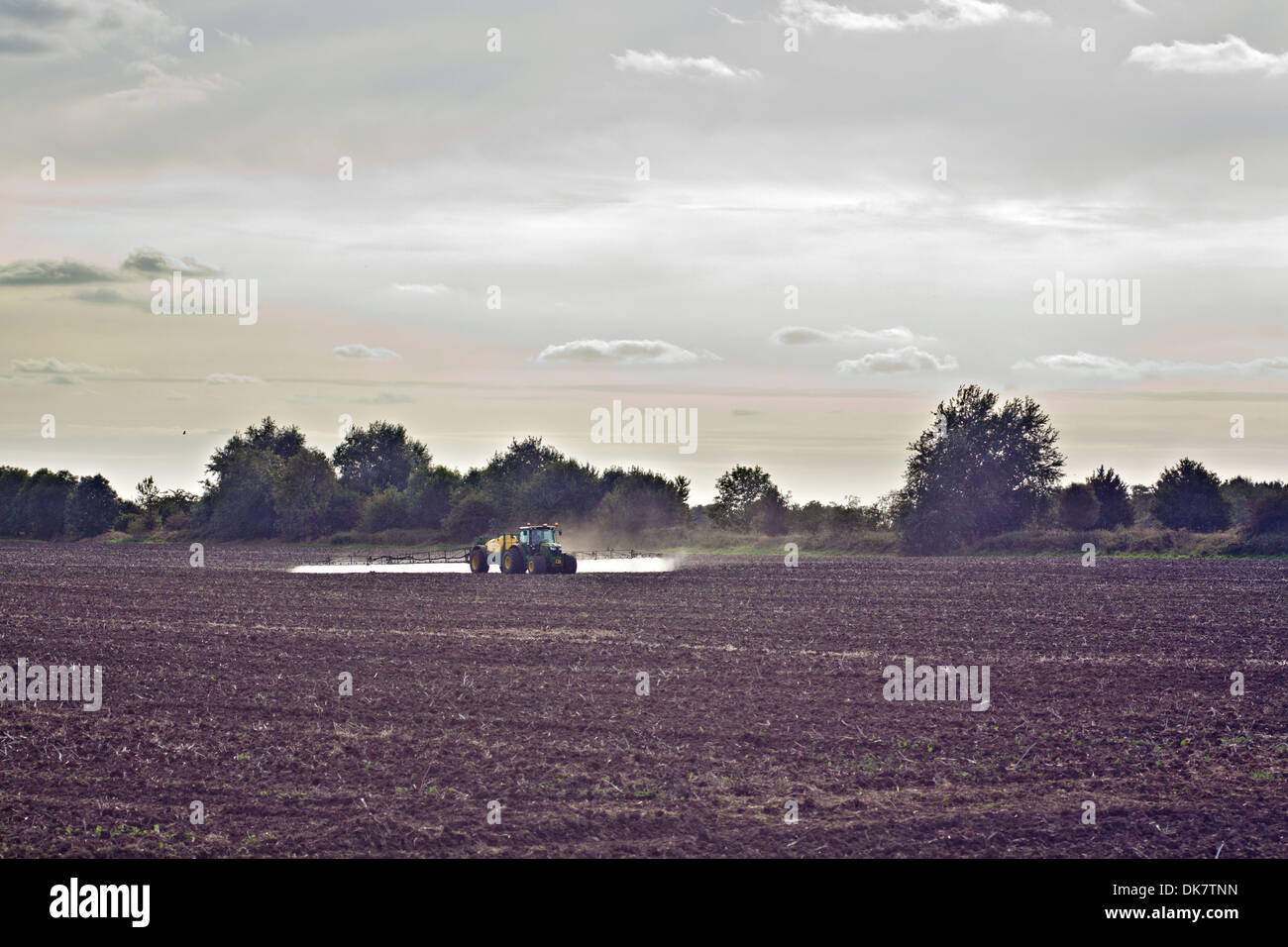 John Deere tractor spraying Fenland field Stock Photo - Alamy