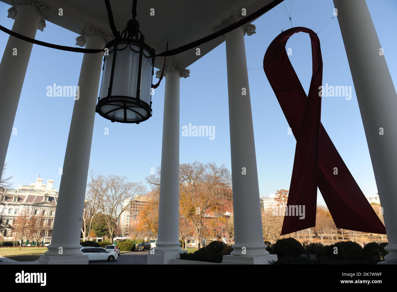 Washington DC, USA. 1st Dec 2013. A huge red ribbon hangs on the North ...