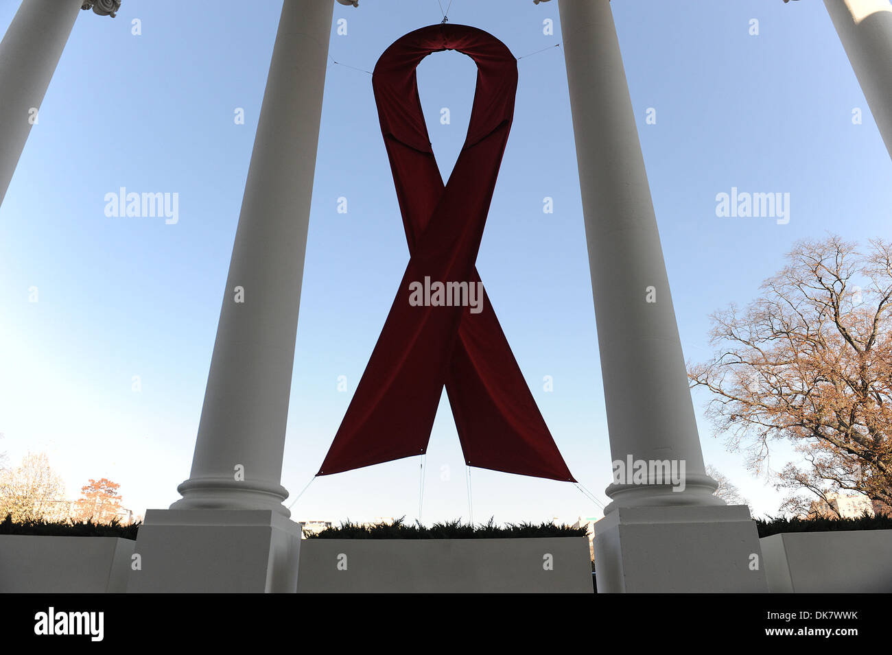 Washington DC, USA. 1st Dec 2013. A huge red ribbon hangs on the North ...