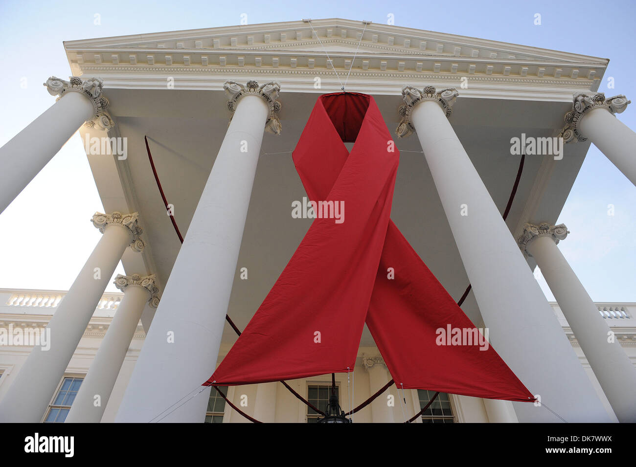 Washington DC, USA. 1st Dec 2013. A huge red ribbon hangs on the North ...