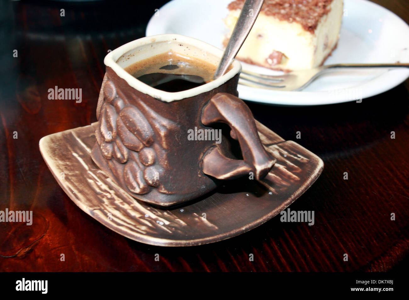 cup of coffee and portion of cake for break Stock Photo - Alamy