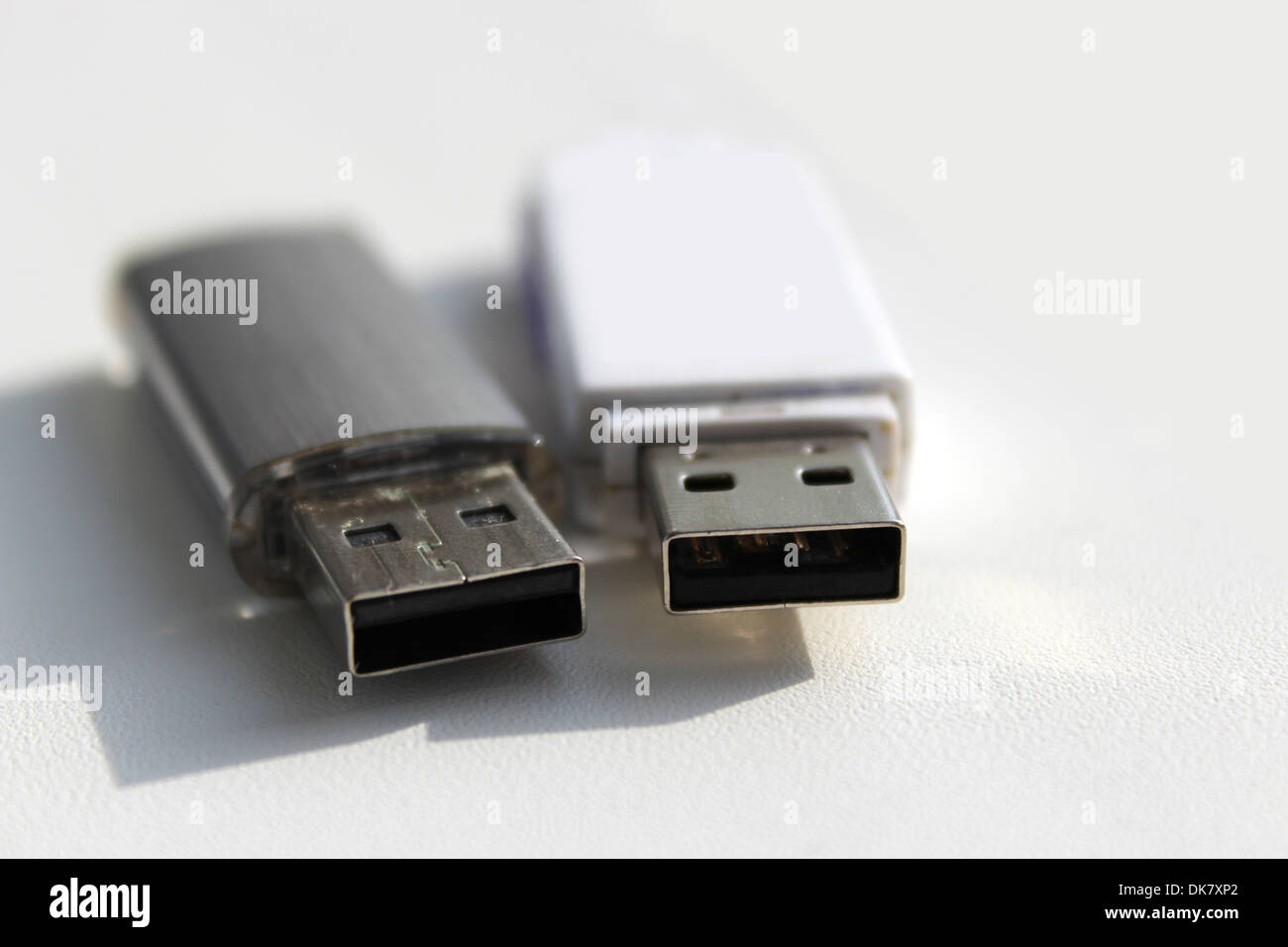two USB flash drive lying on the white background Stock Photo - Alamy