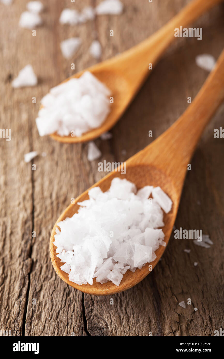 sea salt in wooden scoop Stock Photo - Alamy