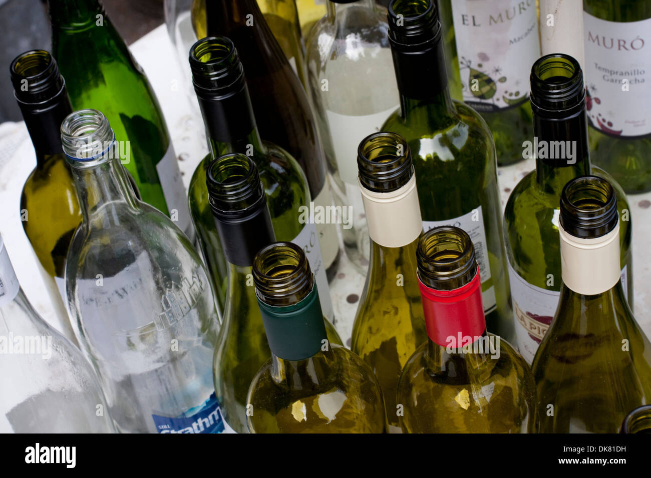 Background pattern from above of primarily empty wine bottles Stock ...