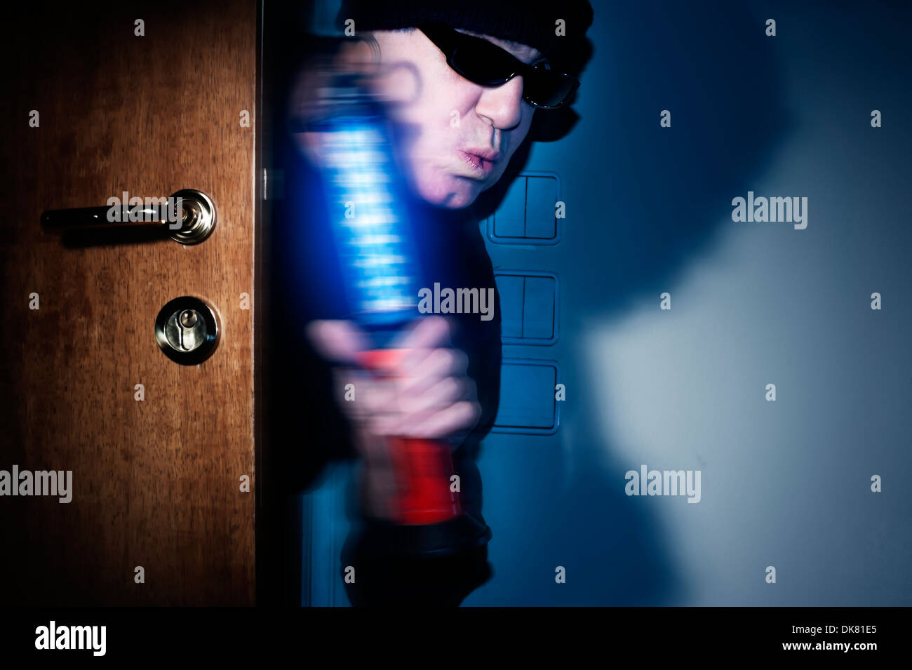 Burglar entering dark room hi-res stock photography and images - Alamy