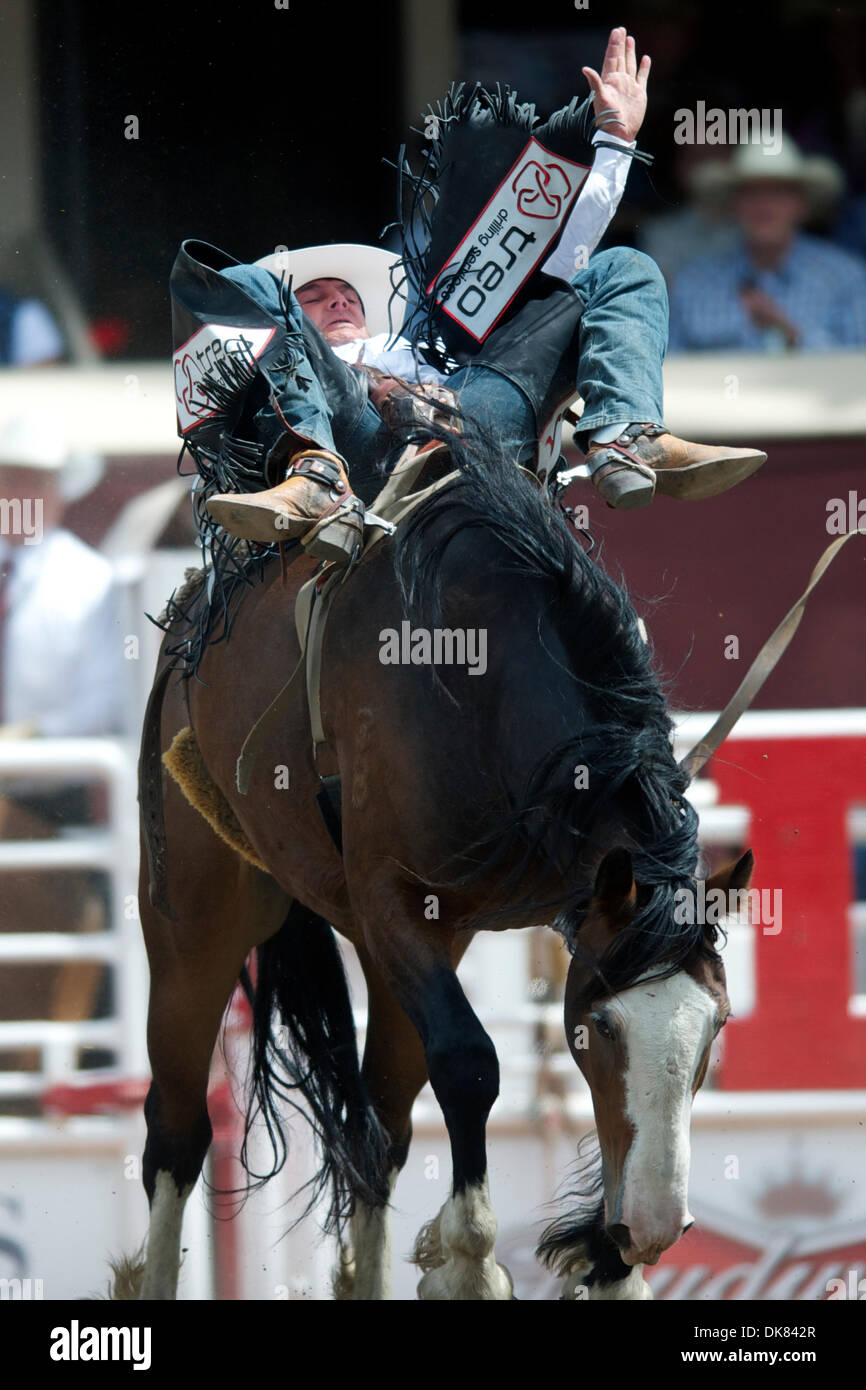 July 9, 2011 - Calgary, Alberta, Canada - Bareback rider Davey Shields ...