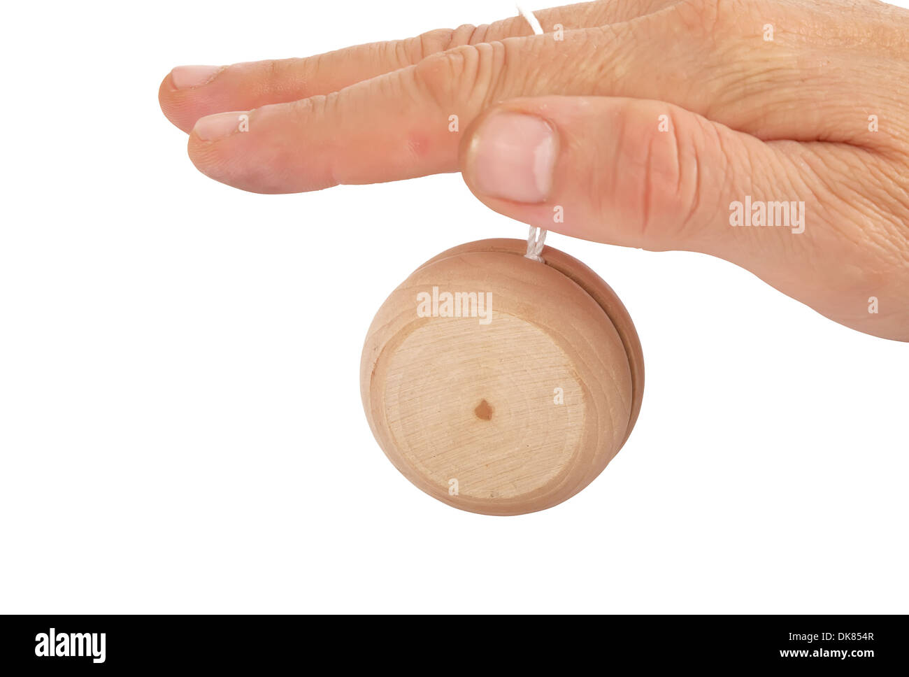 closeup of a hand playing yo-yo over white background Stock Photo - Alamy
