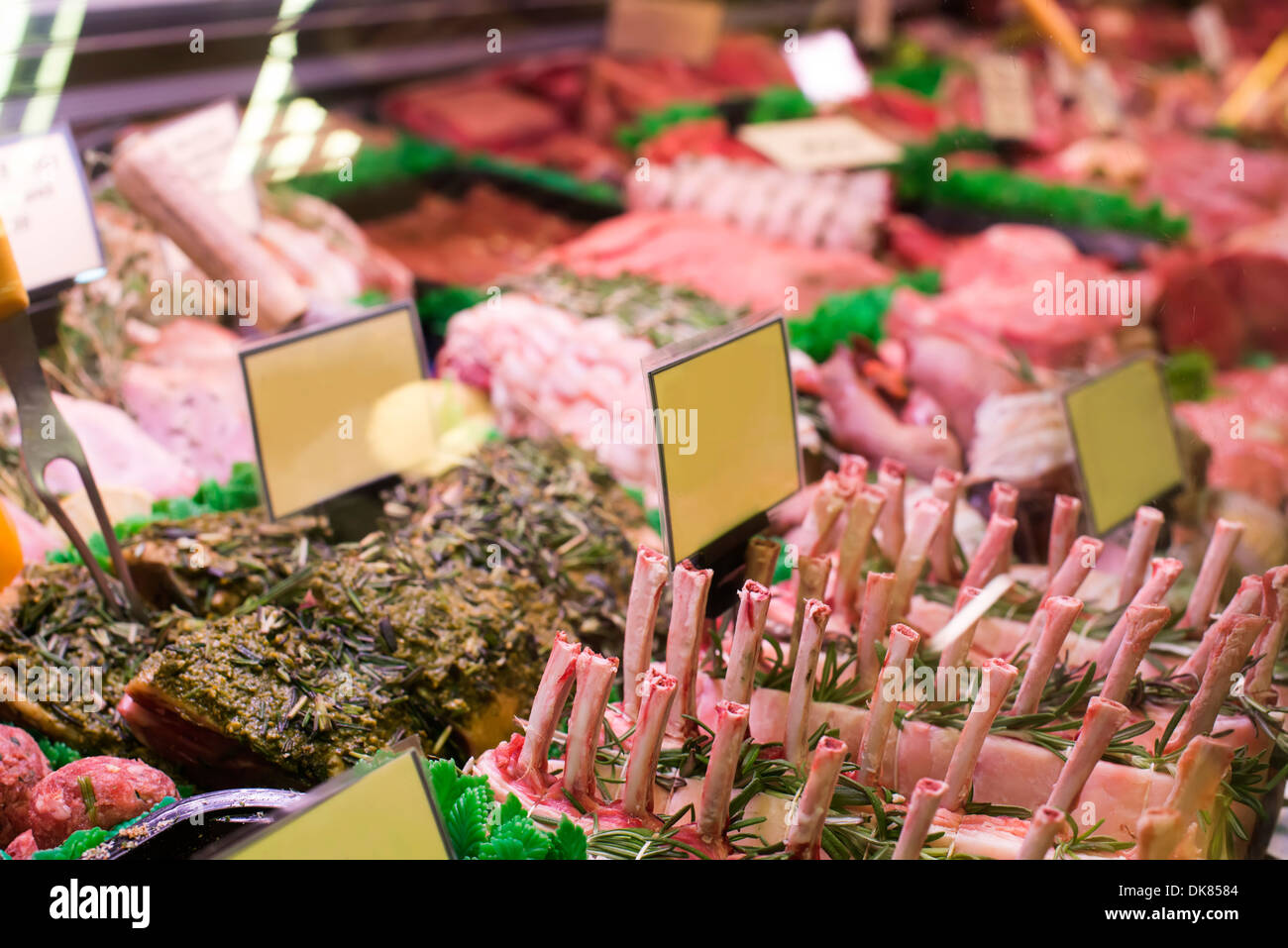 Meat and sausages in a butcher shop. Stand Stock Photo - Alamy