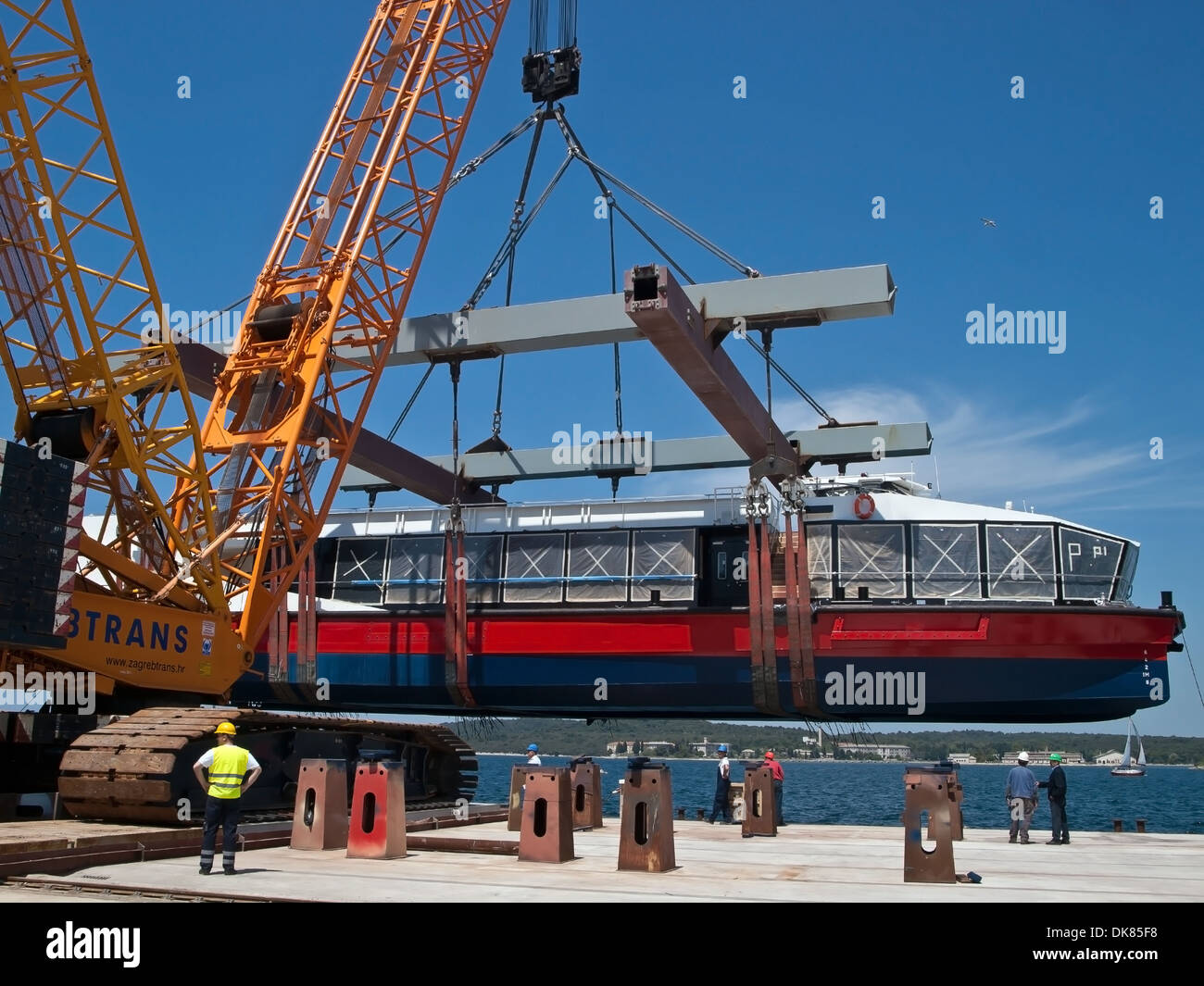 launching new catamaran with launching device Stock Photo - Alamy
