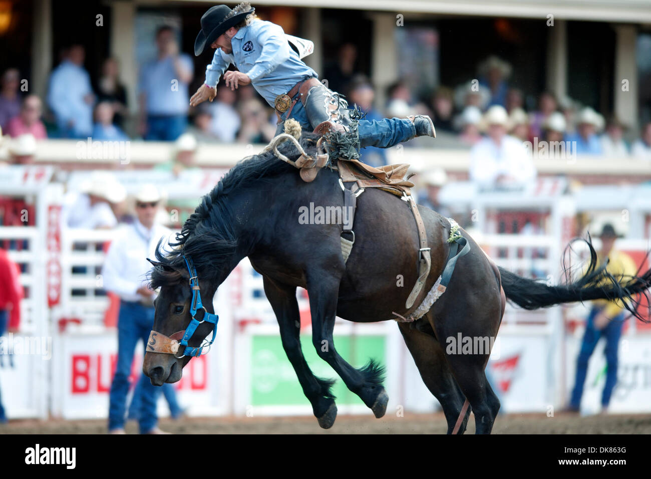 July 10, 2011 - Calgary, Alberta, Canada - Saddle bronc rider Wade ...