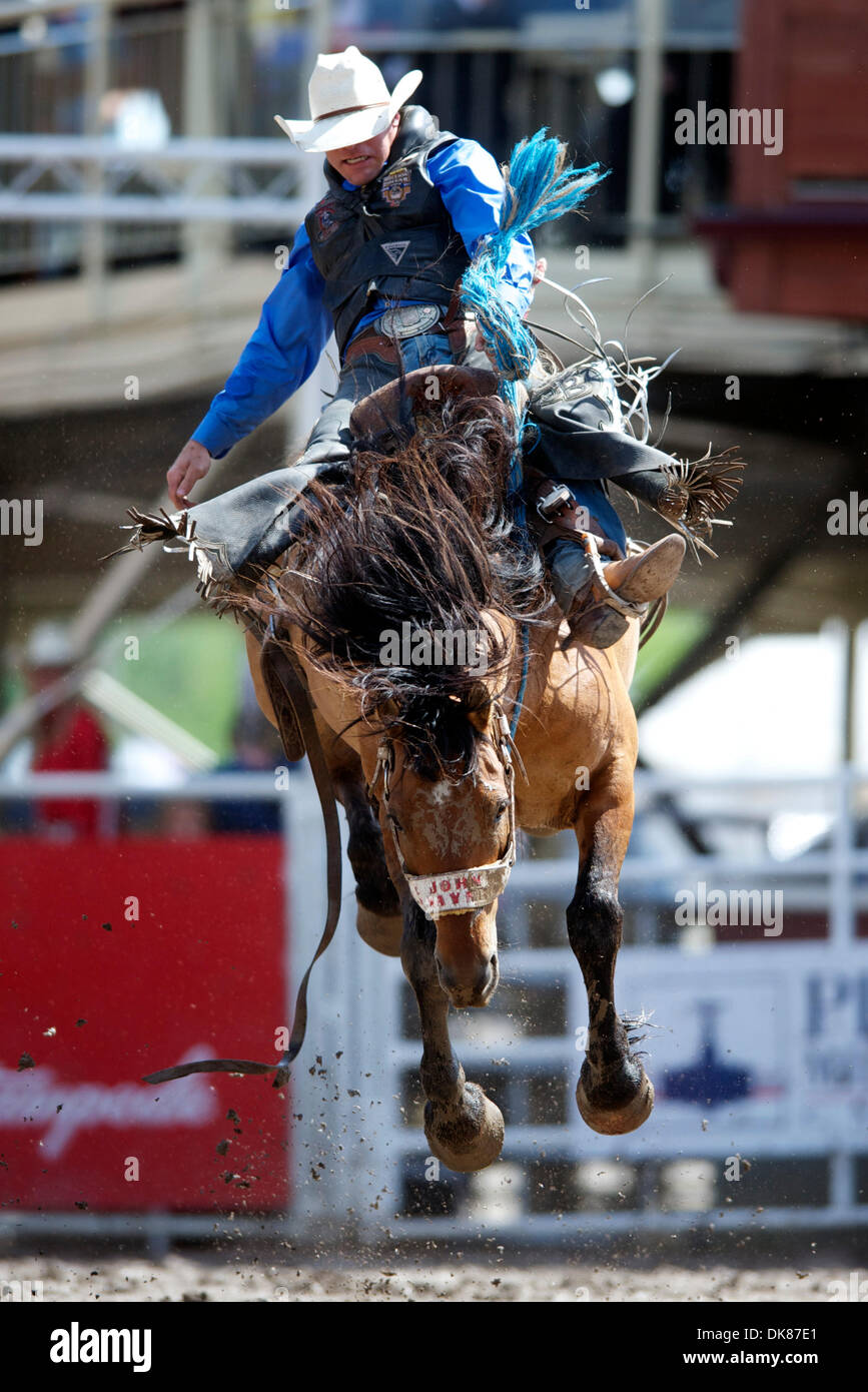July 11, 2011 - Calgary, Alberta, Canada - Saddle bronc rider Jesse ...