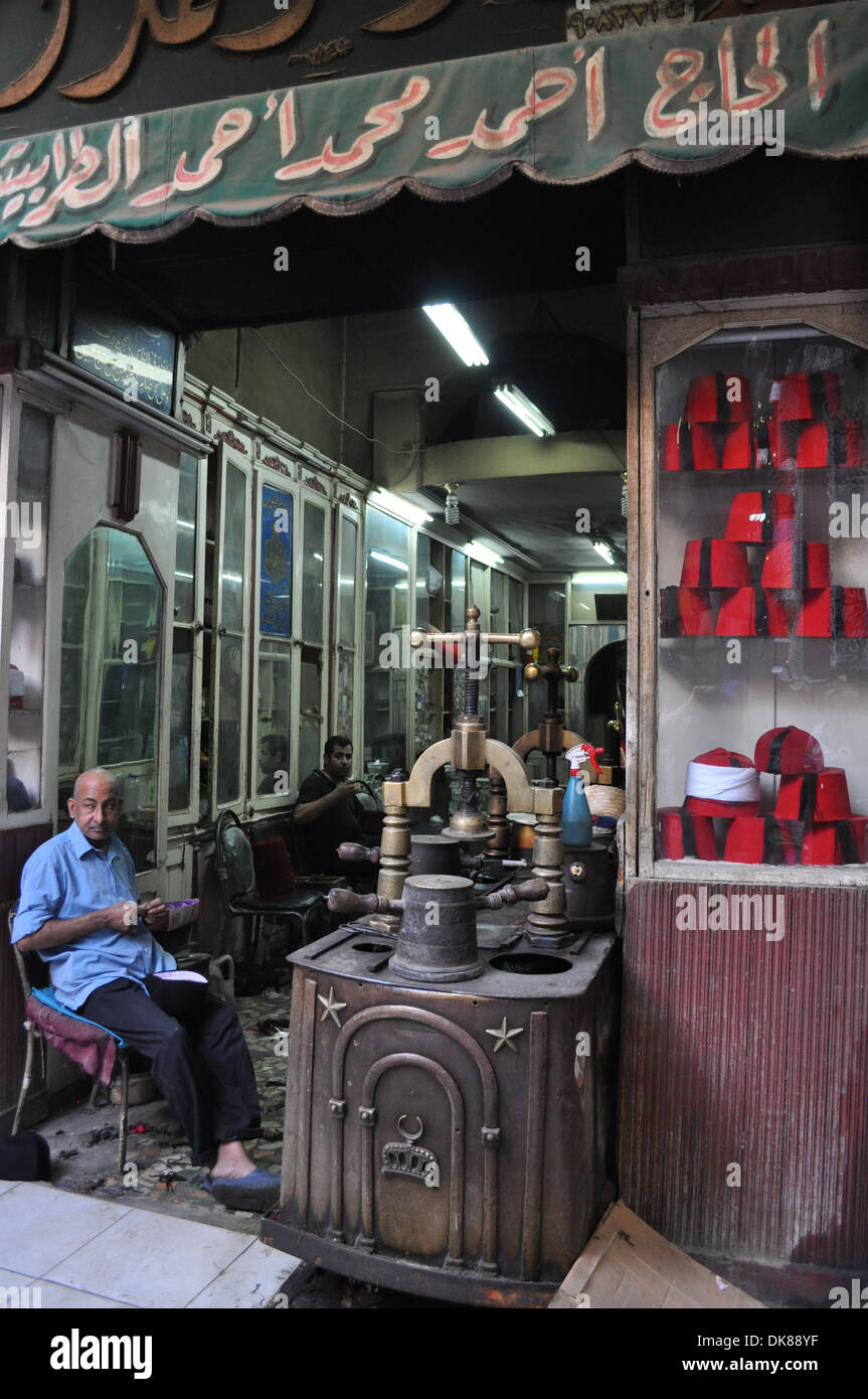 A traditional hat (fez / tarboosh) shop in the Islamic quarter of the ...