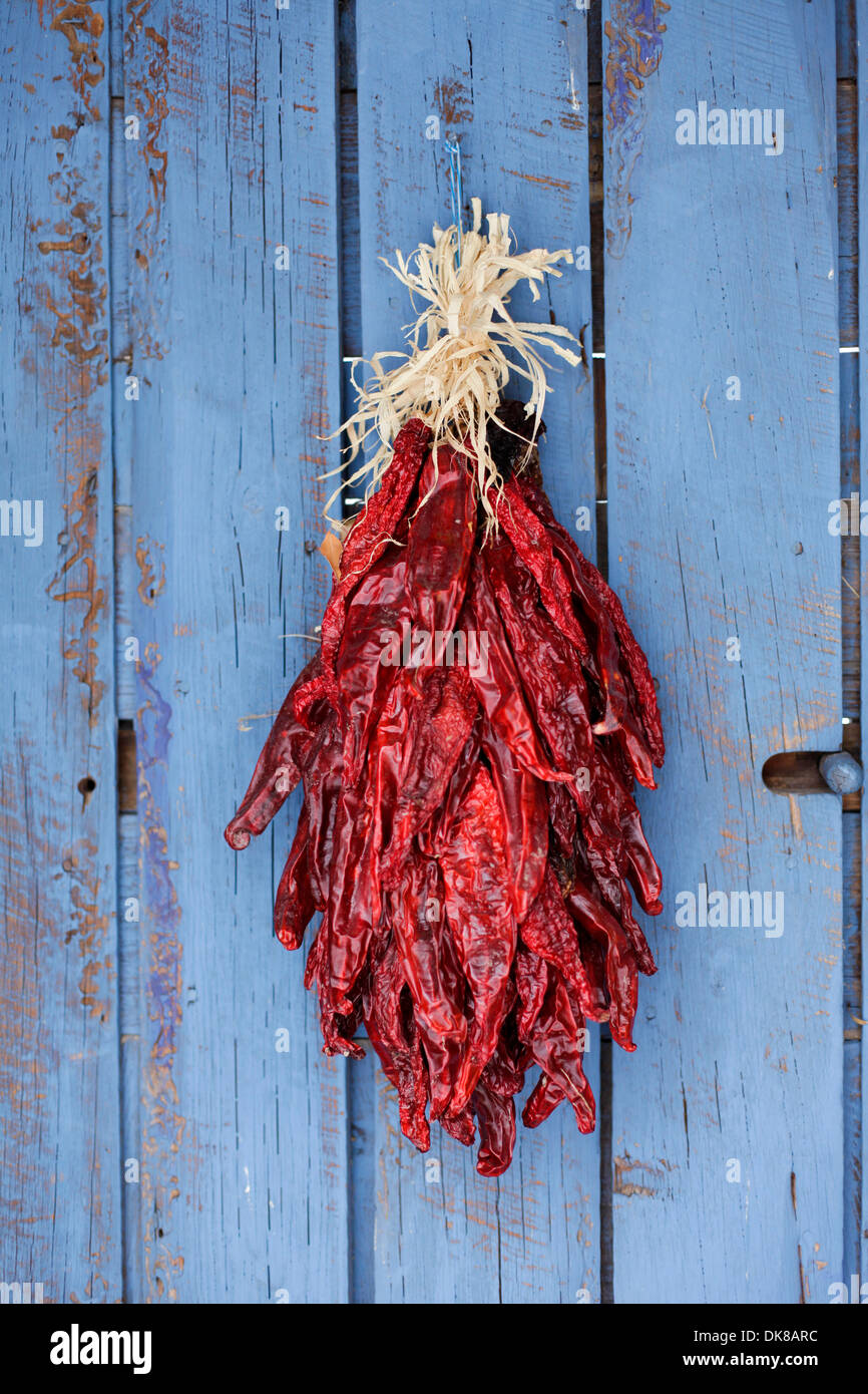 Santa Fe, New Mexico, United States. Traditional chili ristra hangs on ...