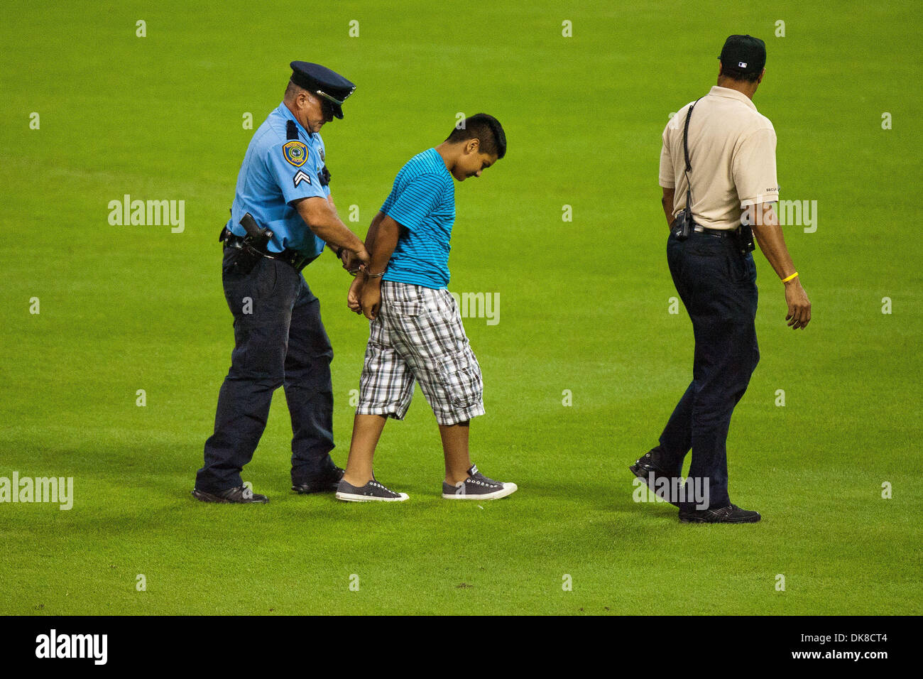 July 18, 2011 - Houston, Texas, U.S - A young fan is being arrested by ...