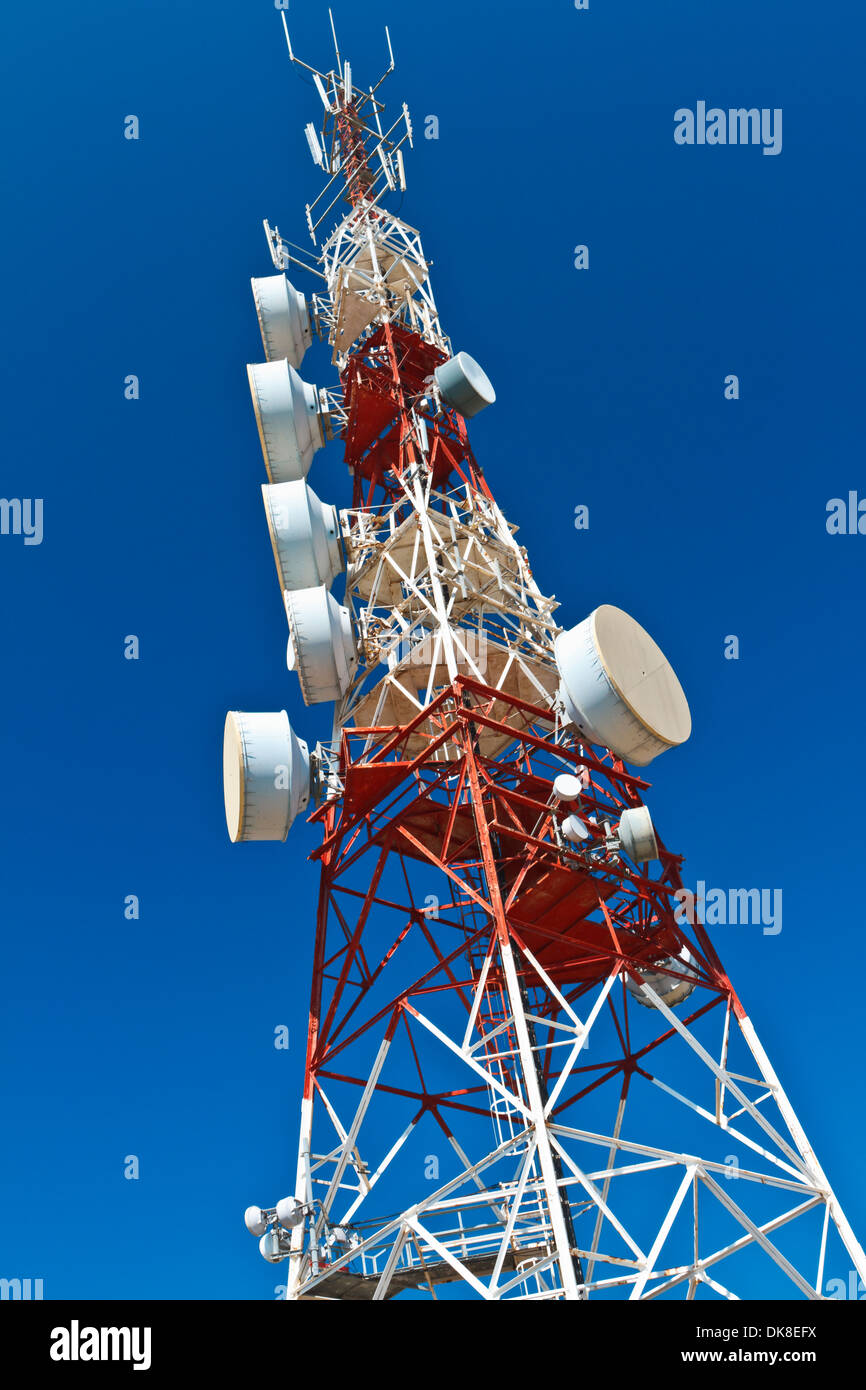 Communications tower with a beautiful blue sky Stock Photo - Alamy
