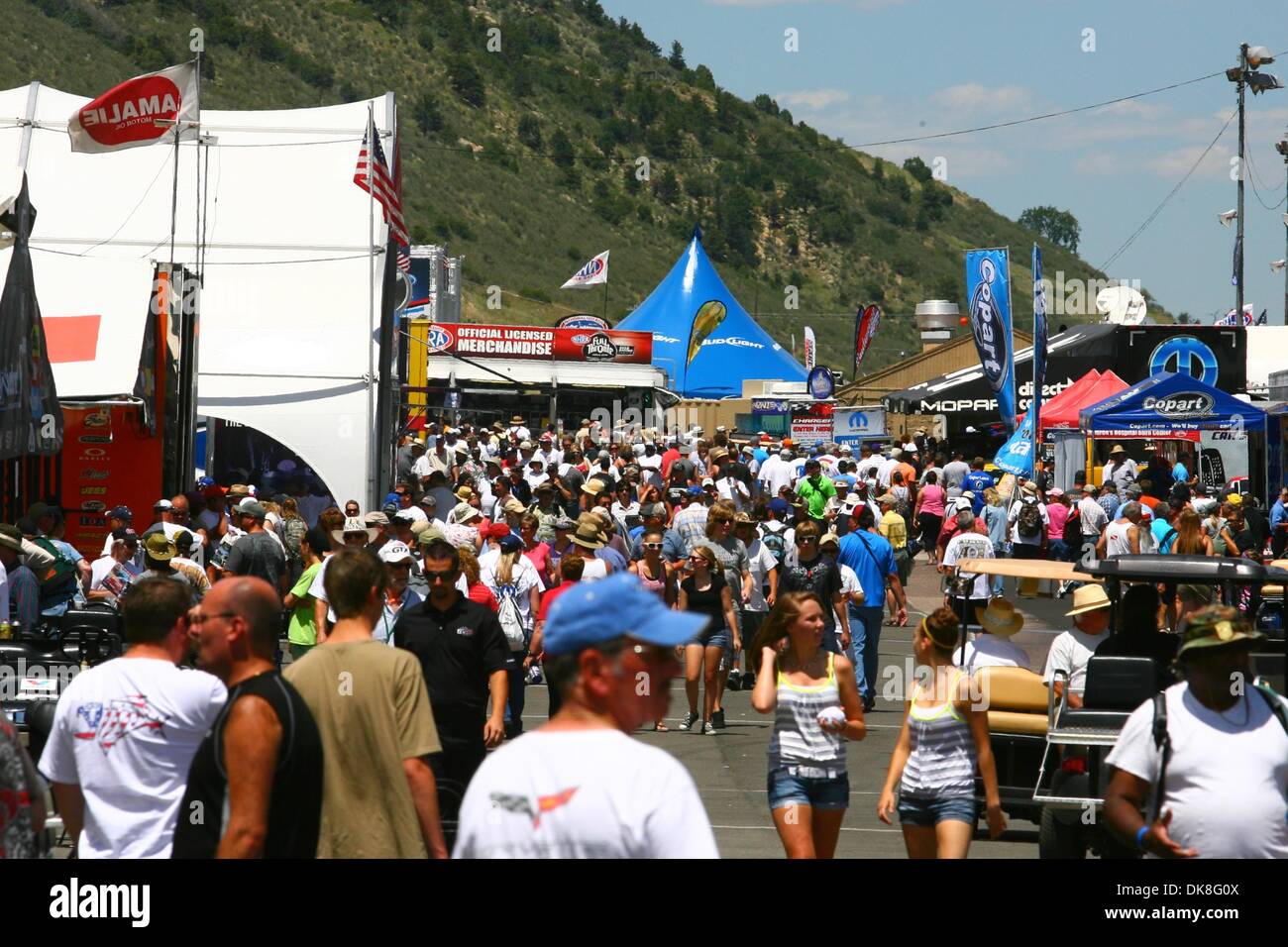 July 22, 2011 - Morrison, Colorado, U.S - Fans walk the pit road ...