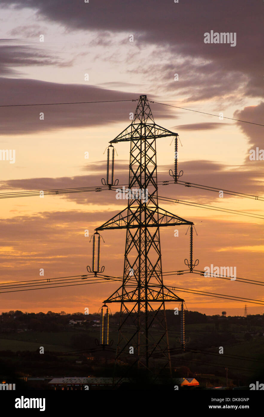 A pylon in the sunrise Stock Photo - Alamy