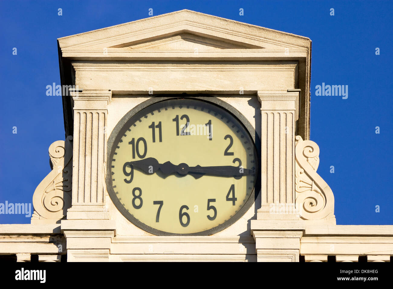 An old clock on the top of a building Stock Photo - Alamy