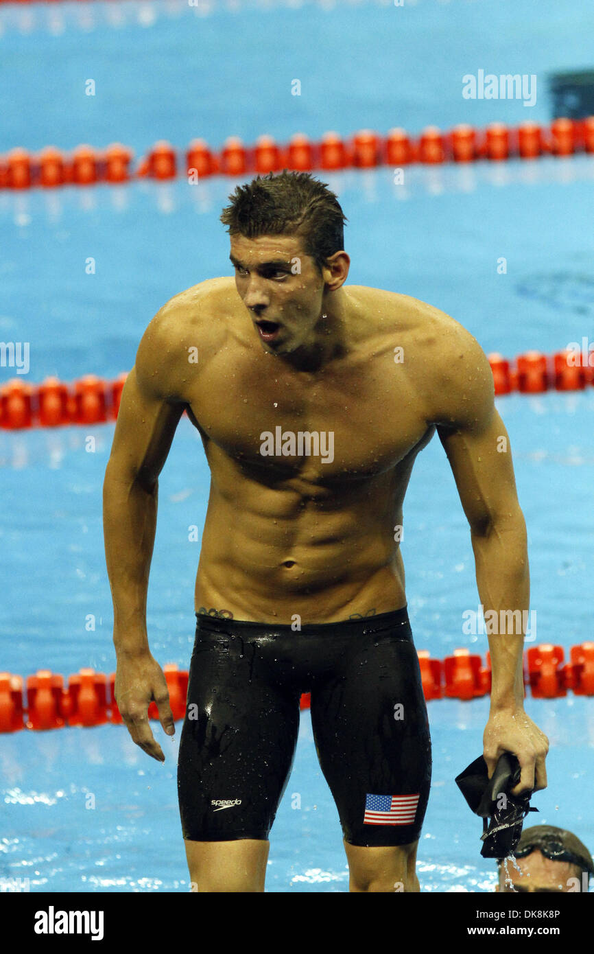 July 26, 2011 - Shanghai, China - USA swimmers MICHAEL PHELPS exits the water after finishing ...